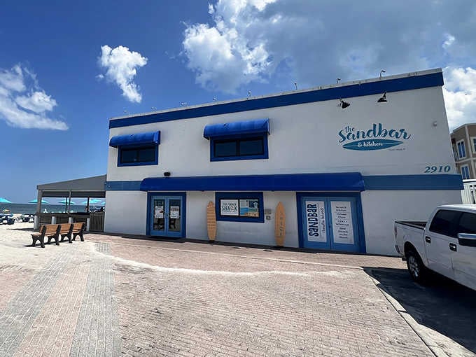 The Sandbar's blue-and-white fa&ccedil;ade promises casual beach fare that somehow tastes better with sand between your toes.