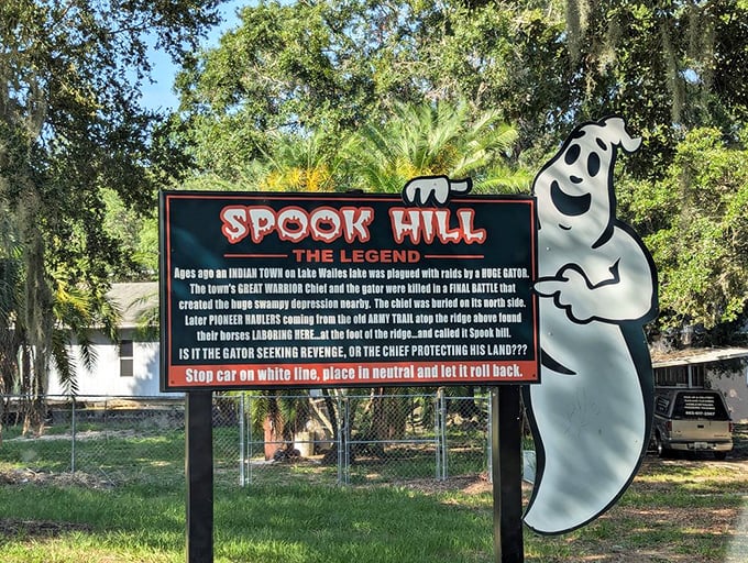 The detailed legend sign explains the epic battle between chief and gator that supposedly created this gravity-defying phenomenon.