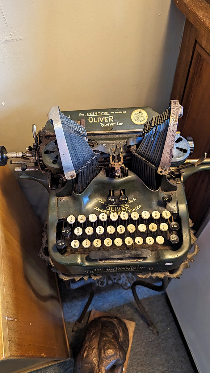 This Oliver "Printype" typewriter sits frozen in time, its bat-wing typebars poised as if waiting for Hemingway to return and finish one last story.