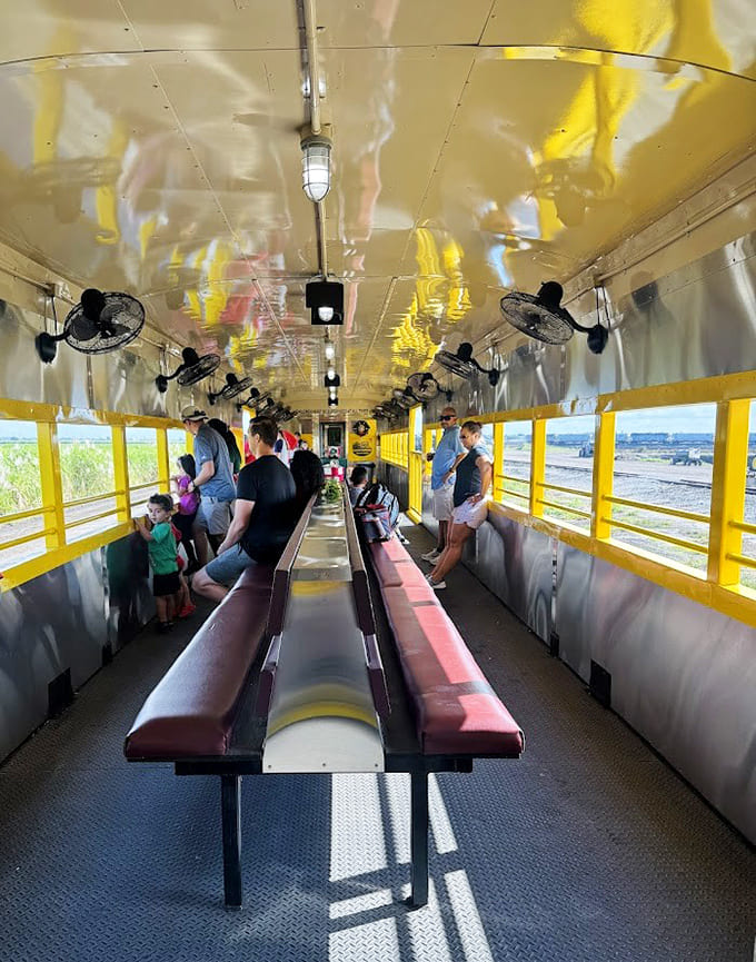 Inside the passenger car, vintage seating and thoughtful details create an atmosphere that's equal parts nostalgia and comfort for the journey ahead.