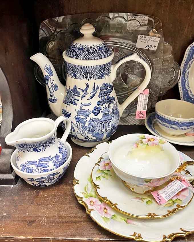 This blue and white tea set whispers tales of elegant afternoons and pinky-raised conversations from an era when teatime was sacred.