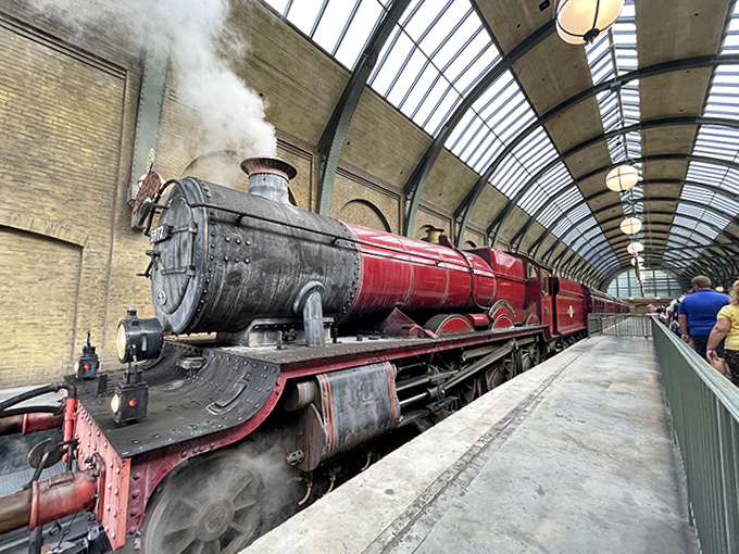 The curved architecture of the platform creates perfect framing for the Hogwarts Express, making even waiting in line feel magical.