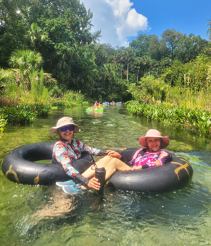 Sun hats and smiles &ndash; the unofficial uniform of Kelly Park's lazy river enthusiasts. These tubers have mastered the art of strategic relaxation.
