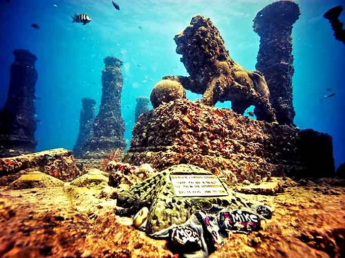 What appears to be ruins of a forgotten civilization reveals itself as an intentional memorial, where art meets marine conservation.