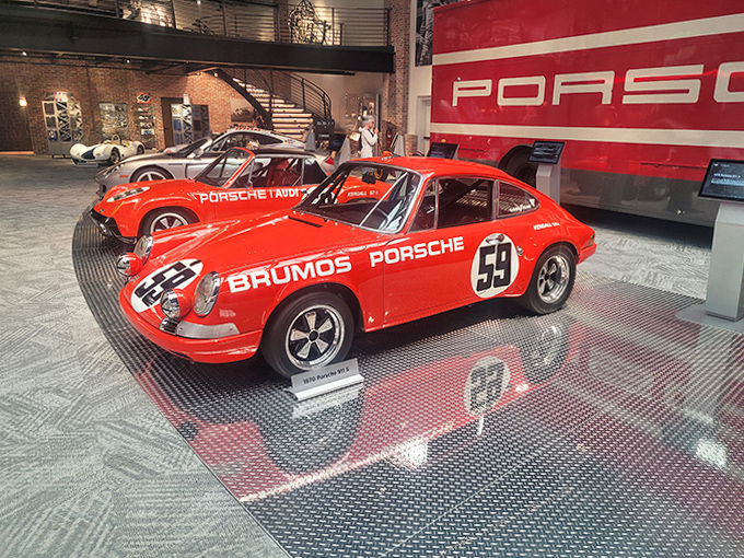 That vintage Porsche wearing Brumos colors sits there like it's ready to tear up Daytona all over again, number 59 still proud after all these years.