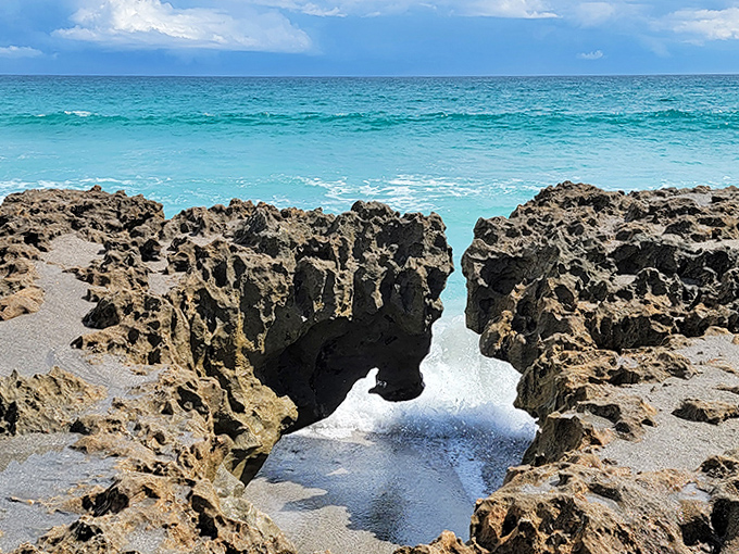 A natural stone archway frames the turquoise Atlantic, like a portal to another world hiding in plain sight.