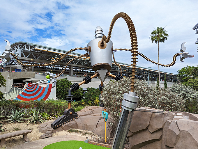 This towering robot sentinel watches over golfers with mechanical curiosity, its tentacle-like arms swaying gently in the Florida breeze.