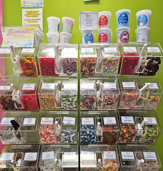 The self-serve gummy station is where adults transform back into kids, strategically selecting each piece like it's fine jewelry.