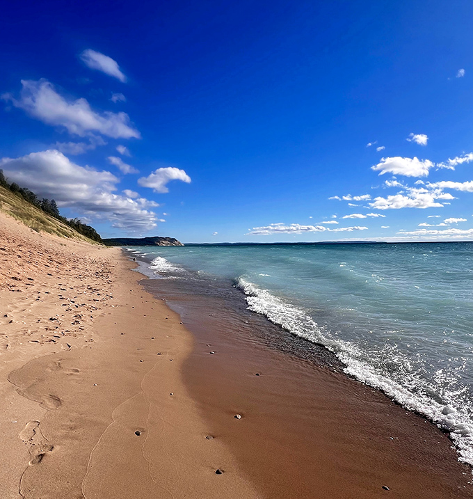 Lake Michigan's shoreline stretches endlessly, where sandy beaches meet waters so blue they rival the Caribbean.