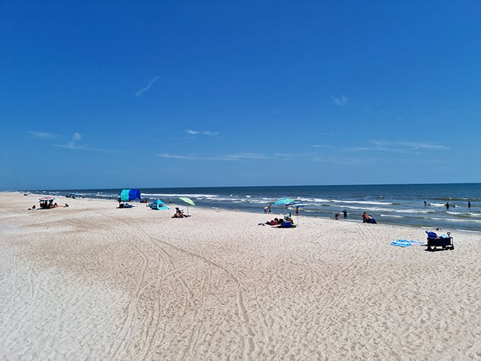 Summer brings beachgoers seeking refuge from Florida's inland heat, with colorful umbrellas dotting the shoreline like confetti on nature's dance floor.