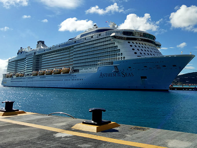 The Anthem of the Seas cruise ship docks nearby, a floating city that makes Mexico Beach's small-town charm feel even more precious by contrast.
