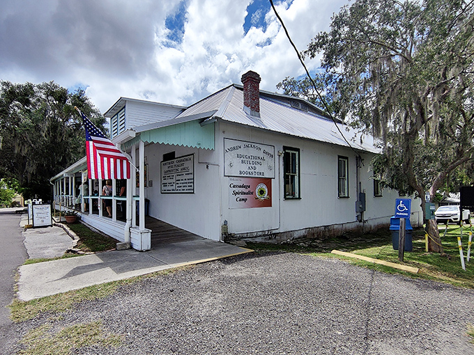 The Andrew Jackson Davis Educational Building houses the camp's bookstore, offering spiritual guidance and bathroom breaks &ndash; because even seekers of higher truths have earthly needs.