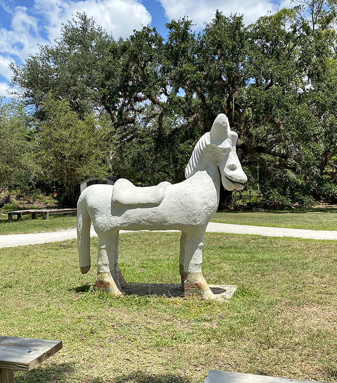 Not your average carousel horse &ndash; this concrete steed stands guard with the stoic dignity of a knight who's forgotten his aluminum armor.