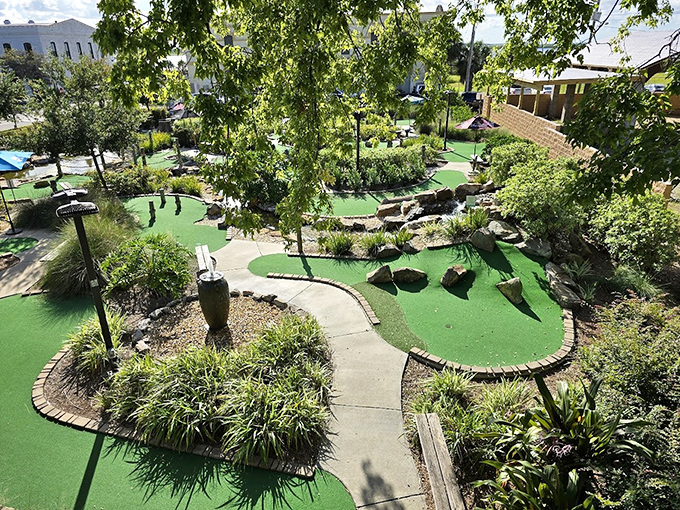 From this bird's-eye view, you can appreciate the thoughtful design that weaves putting greens through lush Florida landscaping.