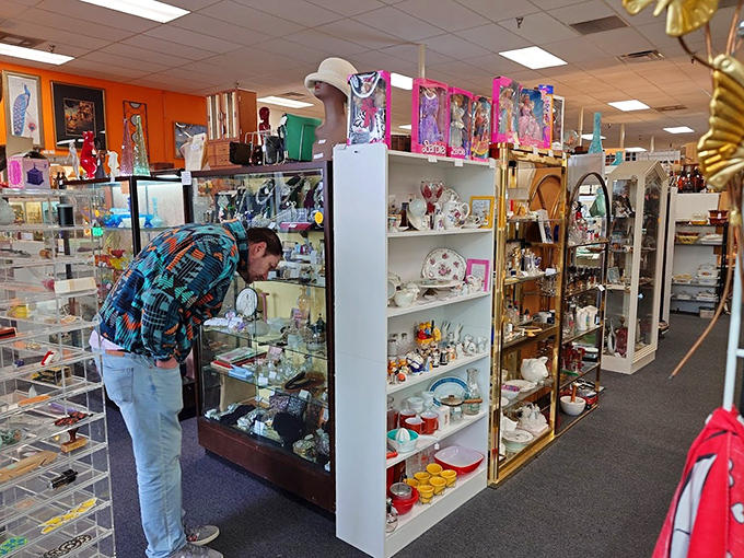 A shopper examines delicate treasures, perhaps finding that perfect piece that connects to a cherished memory.