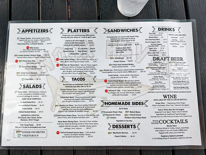 The menu reads like a love letter to Southern comfort food, with smoked specialties taking center stage.