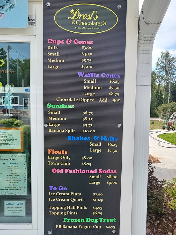 The colorful menu board showcases a dazzling array of frozen treats, from classic cones to elaborate sundaes.