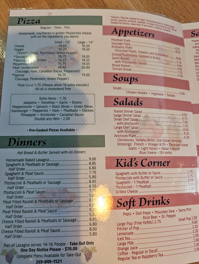 Menu: A treasure map of Italian-American classics where X marks the spot for legendary lasagna, perfect pizzas, and burgers that refuse to be overshadowed.