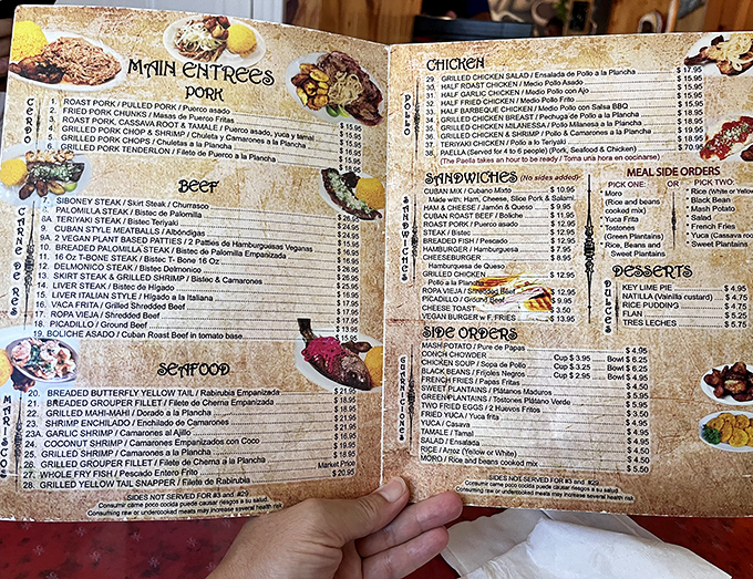 The menu reads like a love letter to Cuban cuisine, with Spanish descriptions adding authenticity to classics like lech&oacute;n asado and ropa vieja.