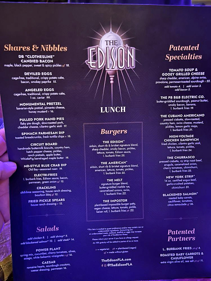The Edison's menu reads like a mad scientist's successful experiments, featuring "Clothesline Candied Bacon" and signature burgers alongside craft cocktails that spark conversation.