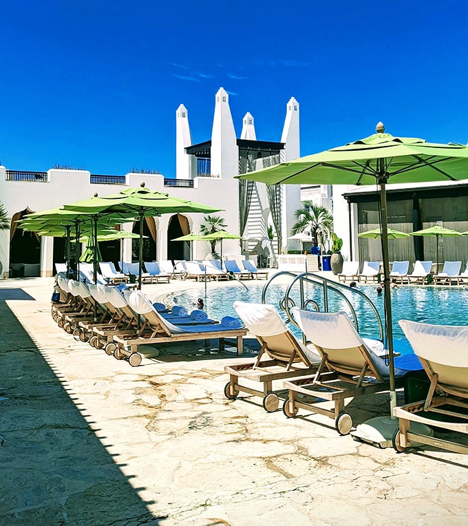 Pool paradise with lime-green umbrellas&mdash;because even relaxation deserves a pop of color.
