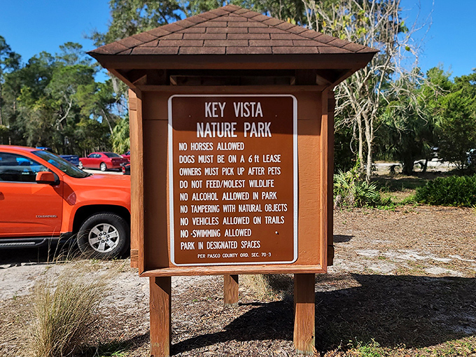 The park rules sign stands as a gentle reminder that we're guests in this natural sanctuary &ndash; no horses, leashed dogs only, and please don't feed the wildlife!