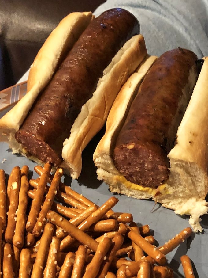 These aren't just any hot dogs &ndash; Bradley's sausages snap with juicy perfection, paired simply with pretzel sticks for a no-nonsense flavor explosion.