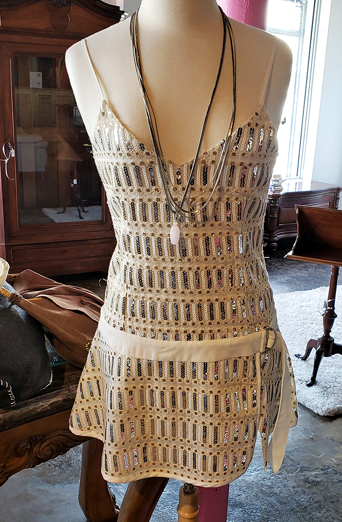 This sequin-embellished mini dress catches light from every angle, ready to transform an ordinary night out into something from the pages of Vogue &ndash; at a fraction of designer prices.