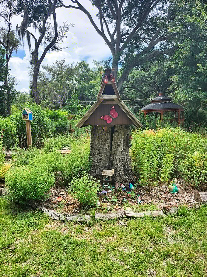 Fairy tale architecture meets Florida wilderness in this charming tree stump home, complete with a butterfly emblem welcoming tiny visitors.