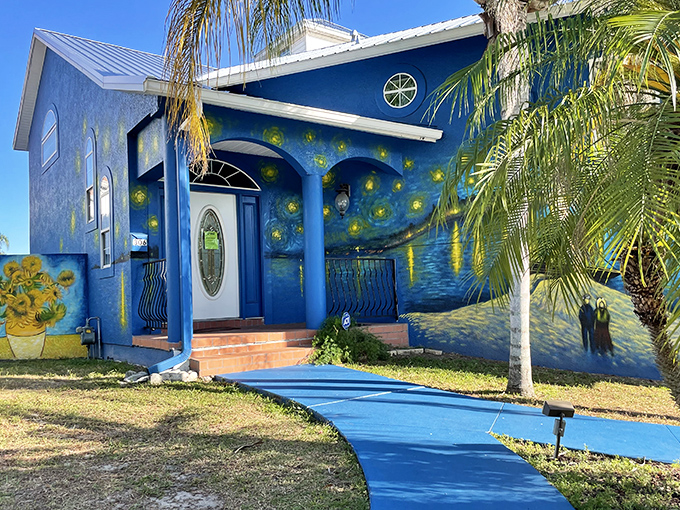 Even the entryway participates in the artistic narrative, with swirling patterns framing the white door like a portal to van Gogh's imagination.
