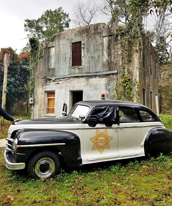 This vintage police cruiser hasn't chased down speeders in decades, but still stands guard outside the jail like a faithful old deputy.
