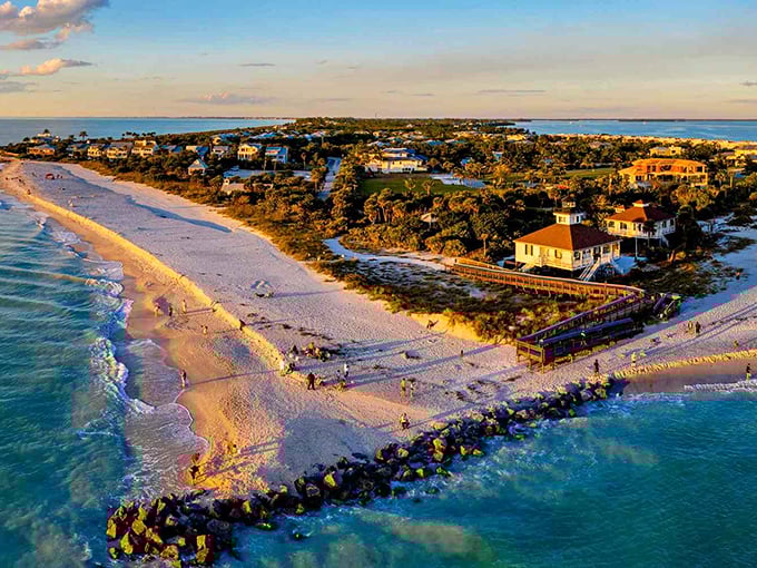 Boca Grande's historic charm shines through its colorful buildings and palm-lined streets, creating a postcard-perfect coastal scene.