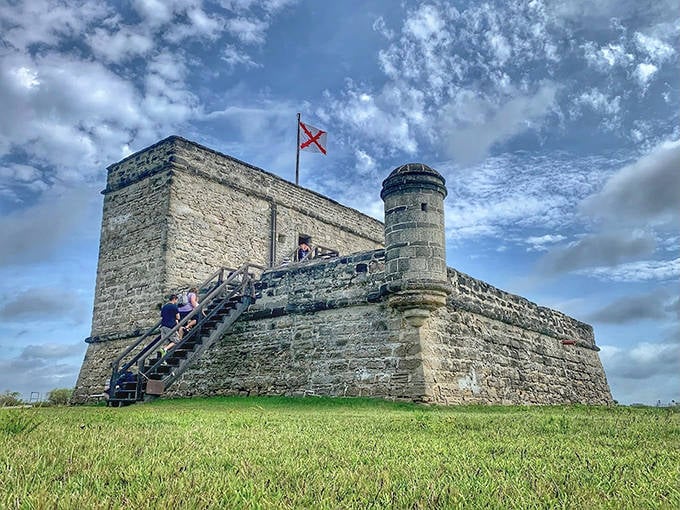 Fort Matanzas combines rugged stone construction with strategic positioning, its watchtower scanning the horizon for approaching threats.