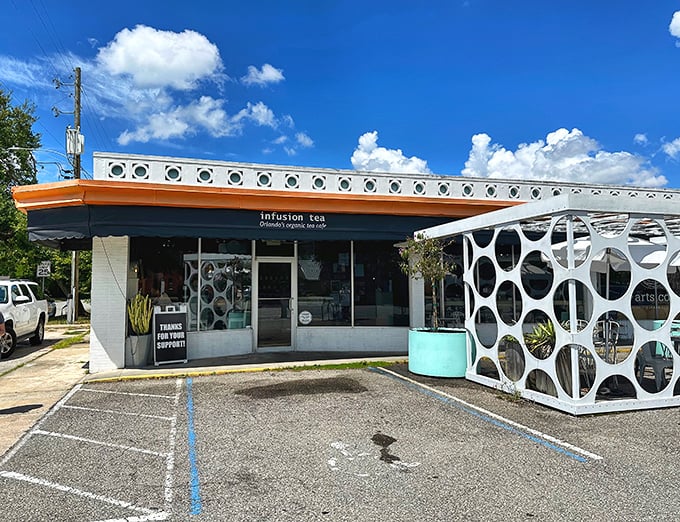 Infusion Tea's unique circular-patterned exterior stands out with its bold, contemporary design in Orlando's College Park.
