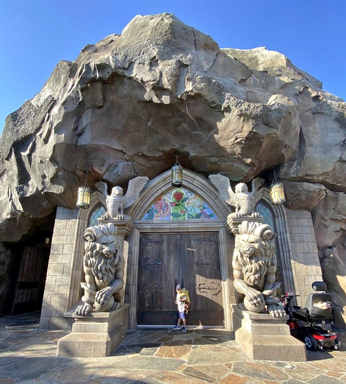 The stone facade and grand entrance of this storybook castle restaurant invite guests to "be their guest." Lion statues stand guard at the entrance to this magical dining experience.