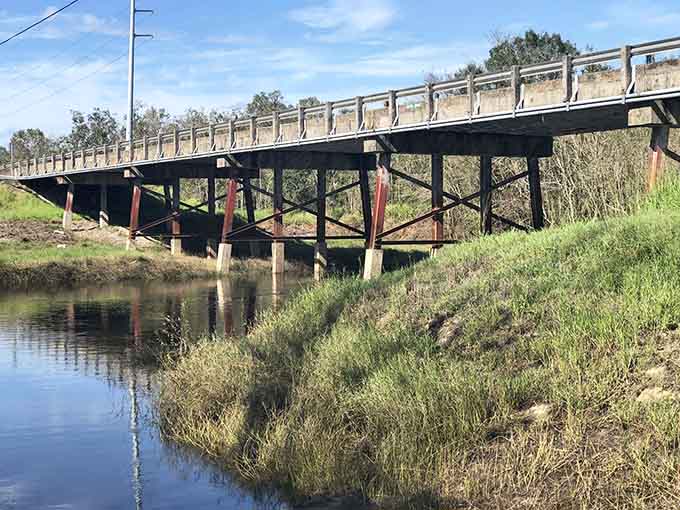 The reflection in this quiet waterway is picture perfect, which somehow makes the local legends even more unsettling.