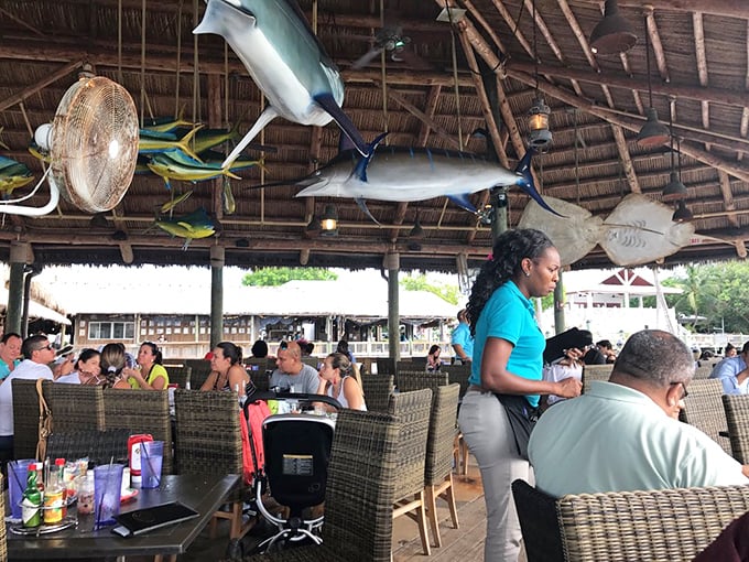 Open-air seating and soft, natural lighting create a relaxed coastal atmosphere at Islamorada Fish Company, with a touch of Keys magic in every corner!