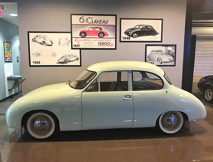 The 1955 Claveau prototype sits in pristine condition, its aerodynamic curves whispering secrets of a future that almost was.