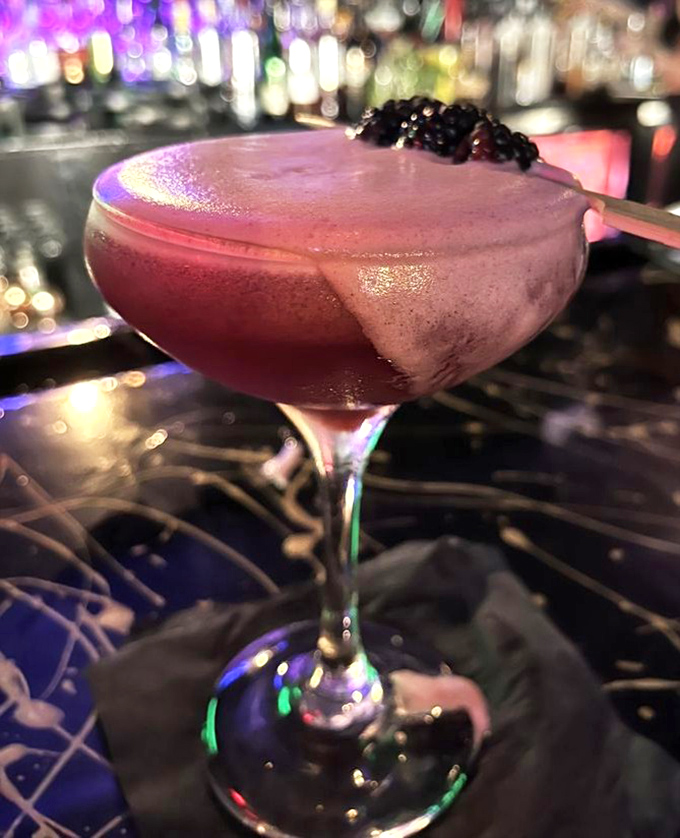 This isn't just a pretty drink; it's a conversation starter, a memory maker, and possibly the beginning of a beautiful friendship.