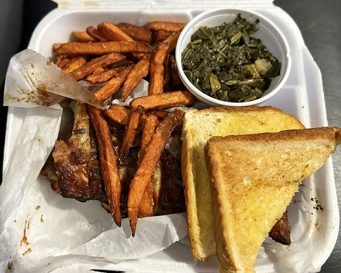 These baby back ribs don't just fall off the bone&mdash;they practically surrender to your fork, glistening with sauce and flanked by golden fries.