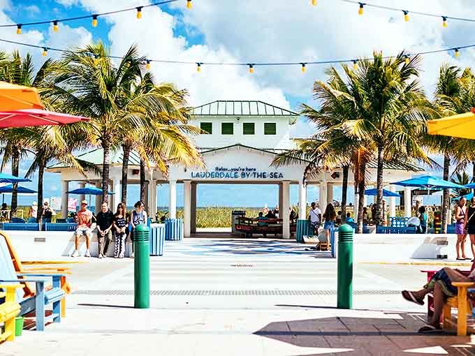 The Beach Pavilion stands as a gateway between civilization and paradise, framed by palms that seem to whisper, "Slow down, you're here now."