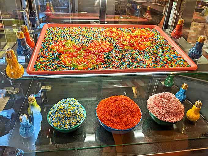 A rainbow explosion of candies and sprinkles awaits &ndash; proof that sometimes the most beautiful art is meant to be eaten.