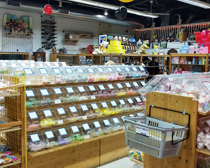 Bulk candy bins stand at attention like sugary soldiers, each one promising a different adventure for your taste buds.
