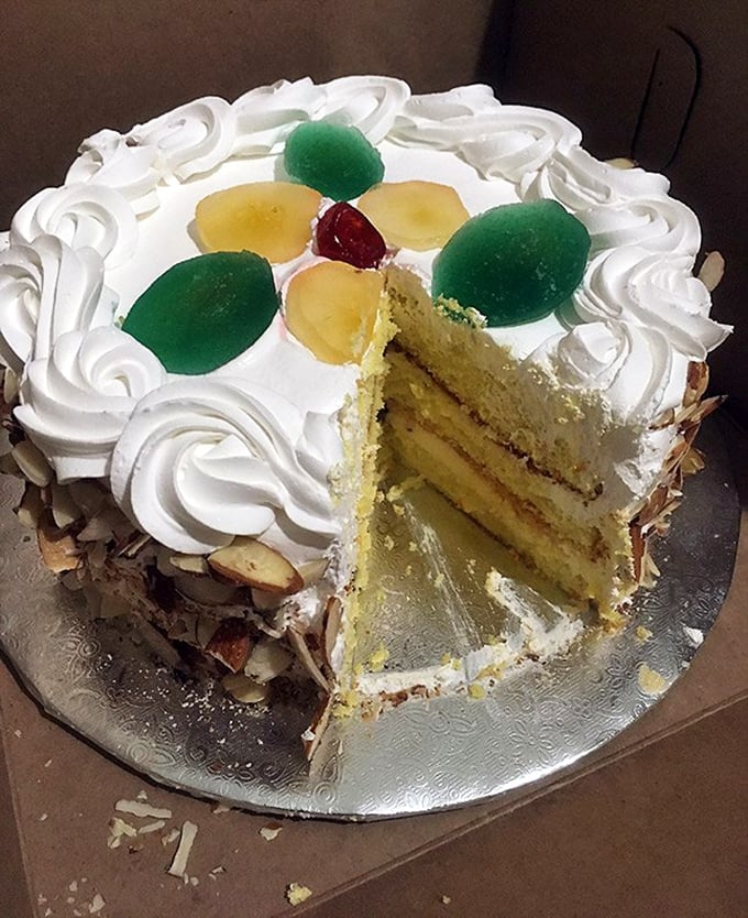 Cassata Cake: Layer upon heavenly layer of sponge, ricotta, and fruit &ndash; like a sweet skyscraper of Sicilian tradition.