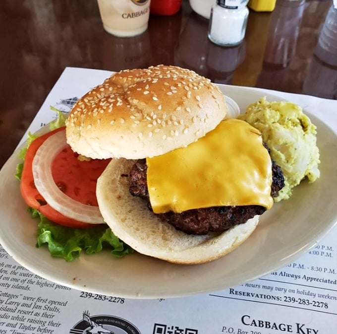 Is this the burger that inspired Jimmy Buffett? The famous Cabbage Key cheeseburger arrives with all the fixings and a side of island lore.