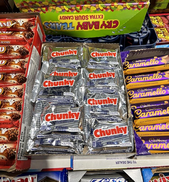 Chunky bars nestled between classic favorites – proof that some chocolate treasures refuse to disappear despite changing candy trends.