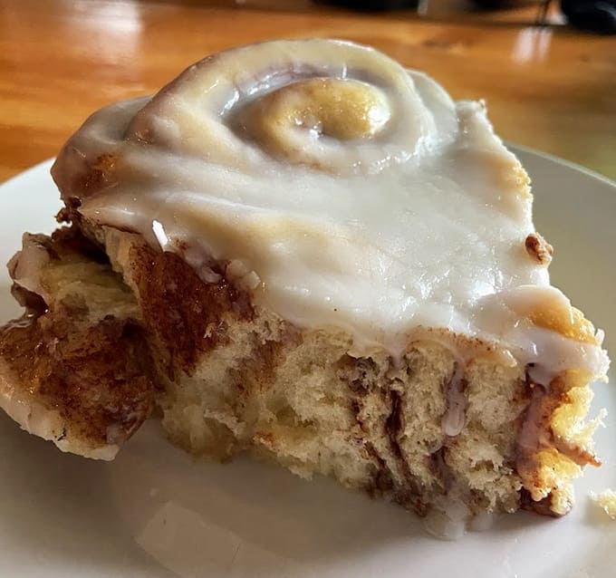 This cinnamon roll cross-section reveals layers of sweet, swirled perfection that would make a geologist weep with envy at such beautiful stratification.