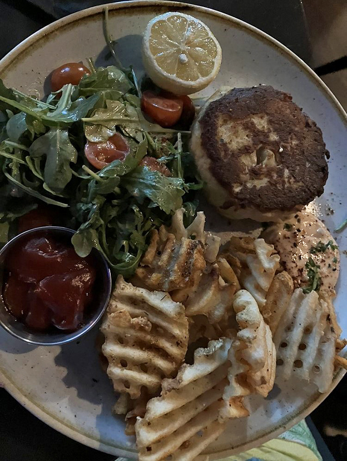 Crab Cake: Maryland-style perfection meets Florida flair in this golden-crusted masterpiece, accompanied by waffle fries that redefine the meaning of "crispy."