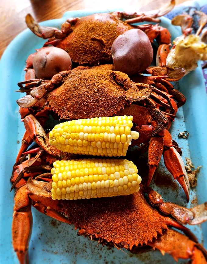Blue crabs dusted with spices, sweet corn glistening with butter &ndash; a Florida feast that requires no silverware, just enthusiasm and napkins.