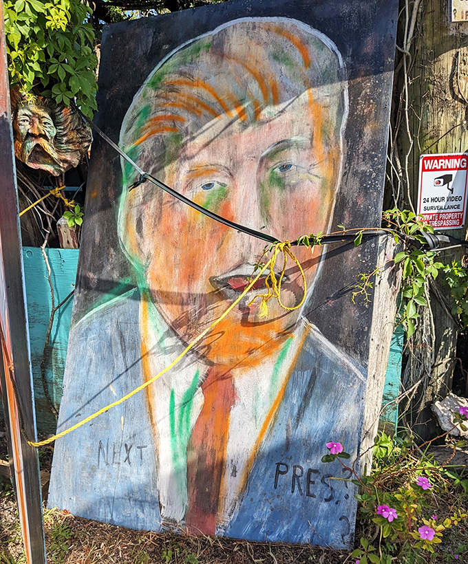 Bold colors and distinctive styling mark this portrait, showcasing the gallery's surprising range beyond traditional wooden sculptures.